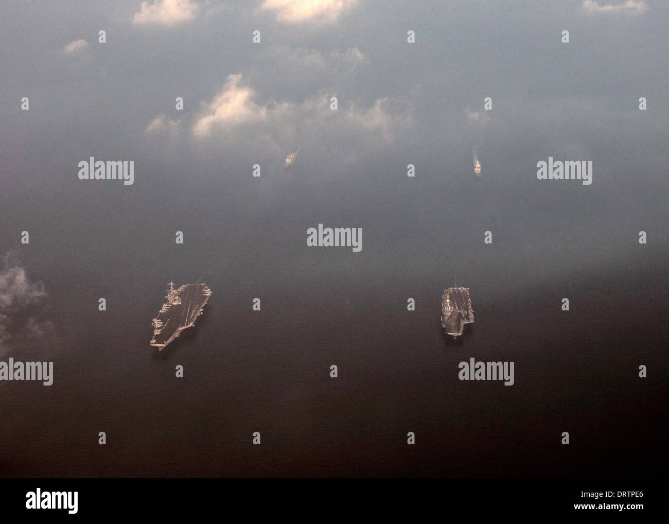 Aircraft carriers USS Harry S. Truman and FS Charles de Gaulle along ...