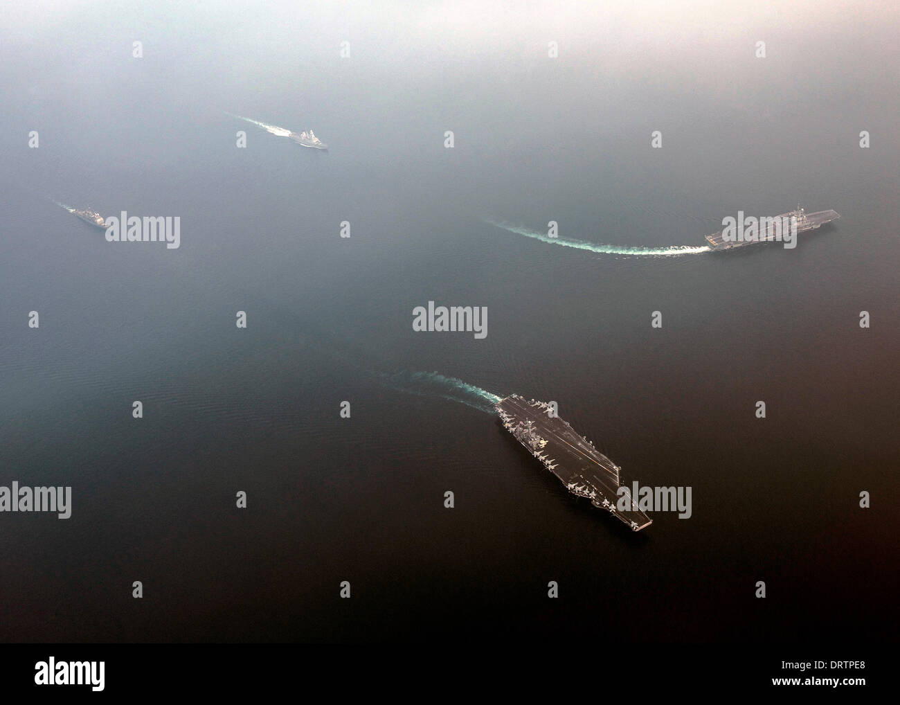 Aircraft carriers USS Harry S. Truman and FS Charles de Gaulle along ...