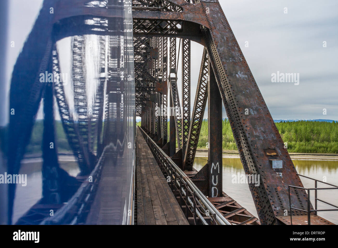 Alaska Railroad train crossing Mears Memorial railroad bridge over ...
