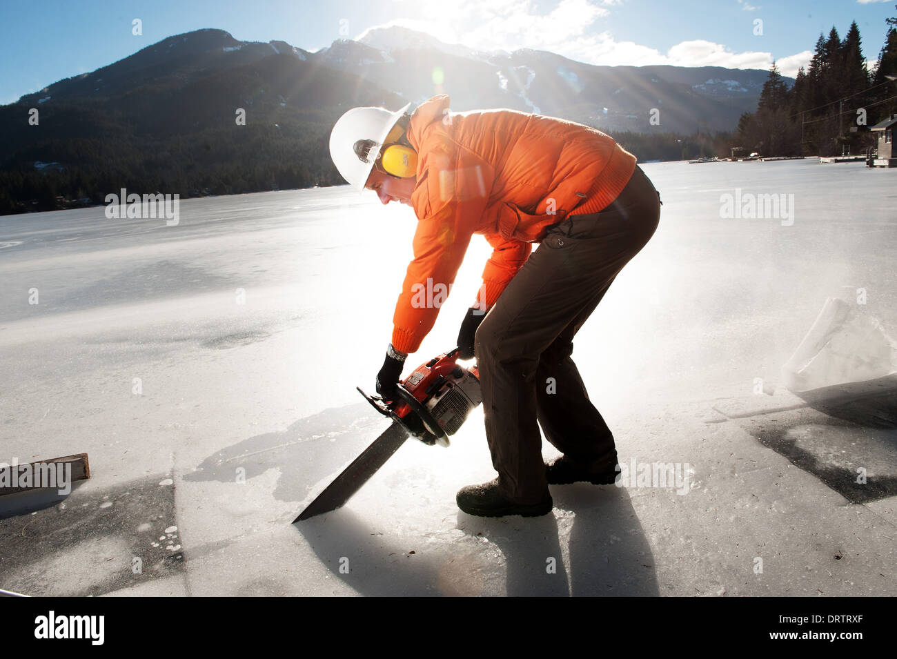 Chainsaw ice carving lake hi-res stock photography and images - Alamy