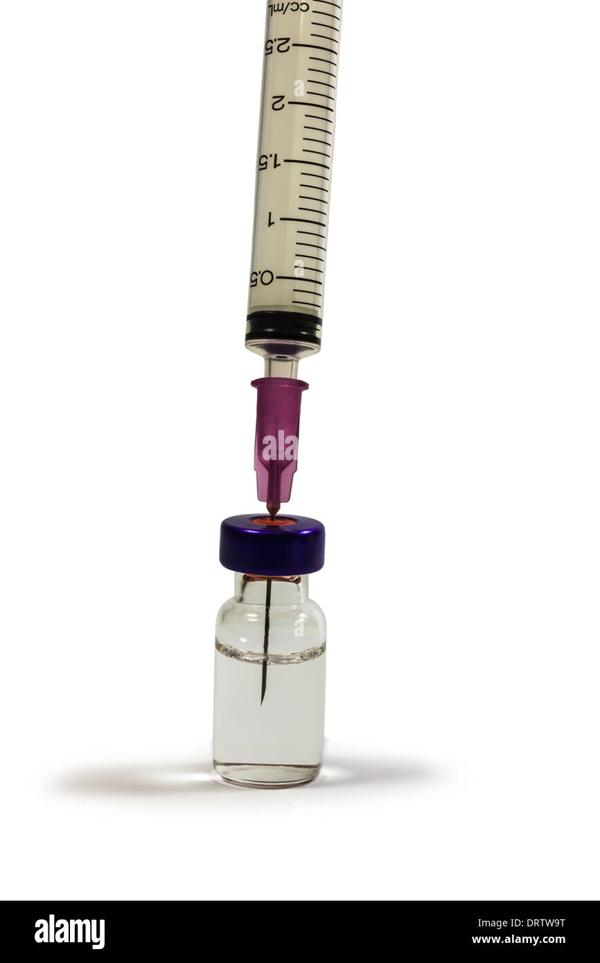 Medical bottle and syringe on white background Stock Photo - Alamy