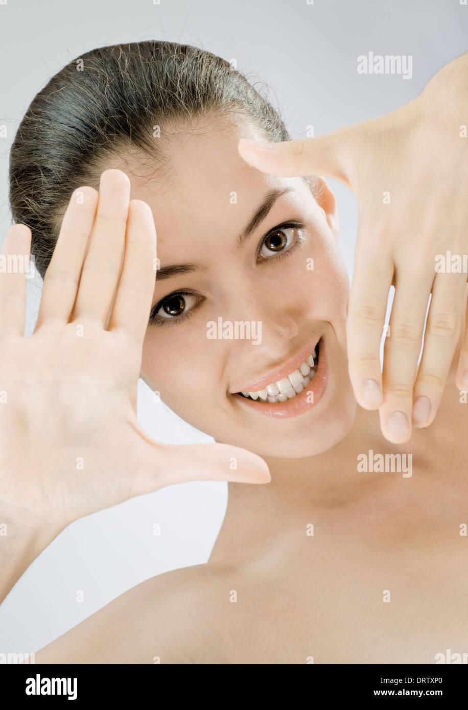 person making a frame of their hands Stock Photo - Alamy