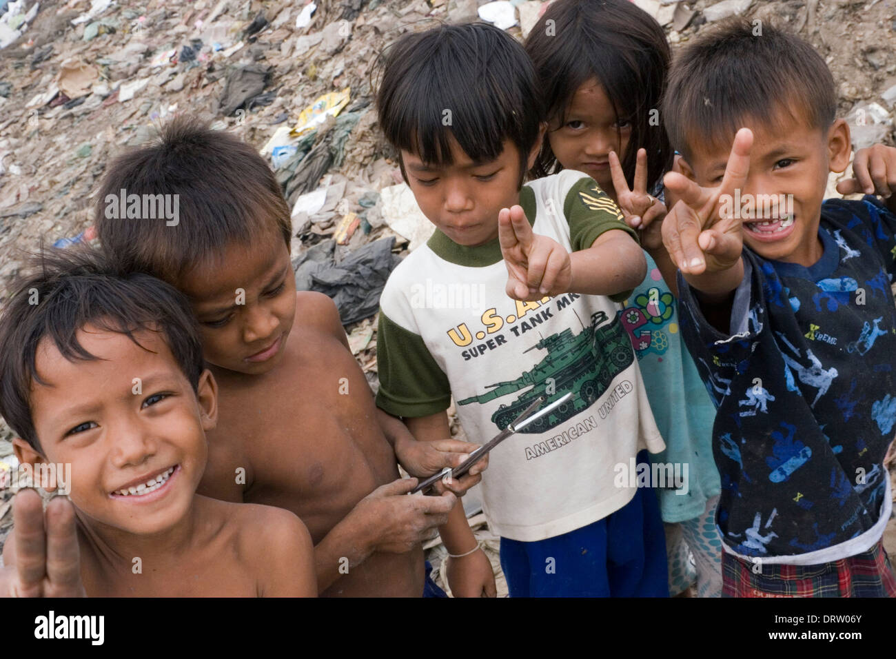 Child laborers are taking a break from their jobs as scavengers at the ...