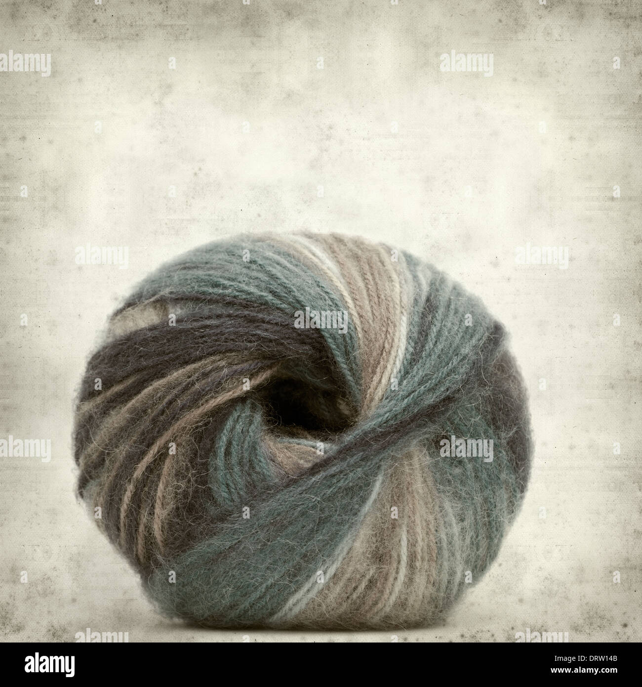 textured old paper background with variegated knitting wool Stock Photo ...