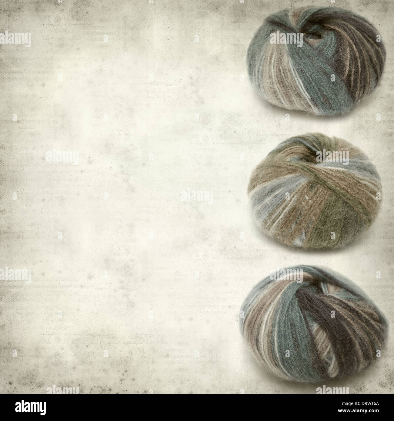 textured old paper background with variegated knitting wool Stock Photo ...