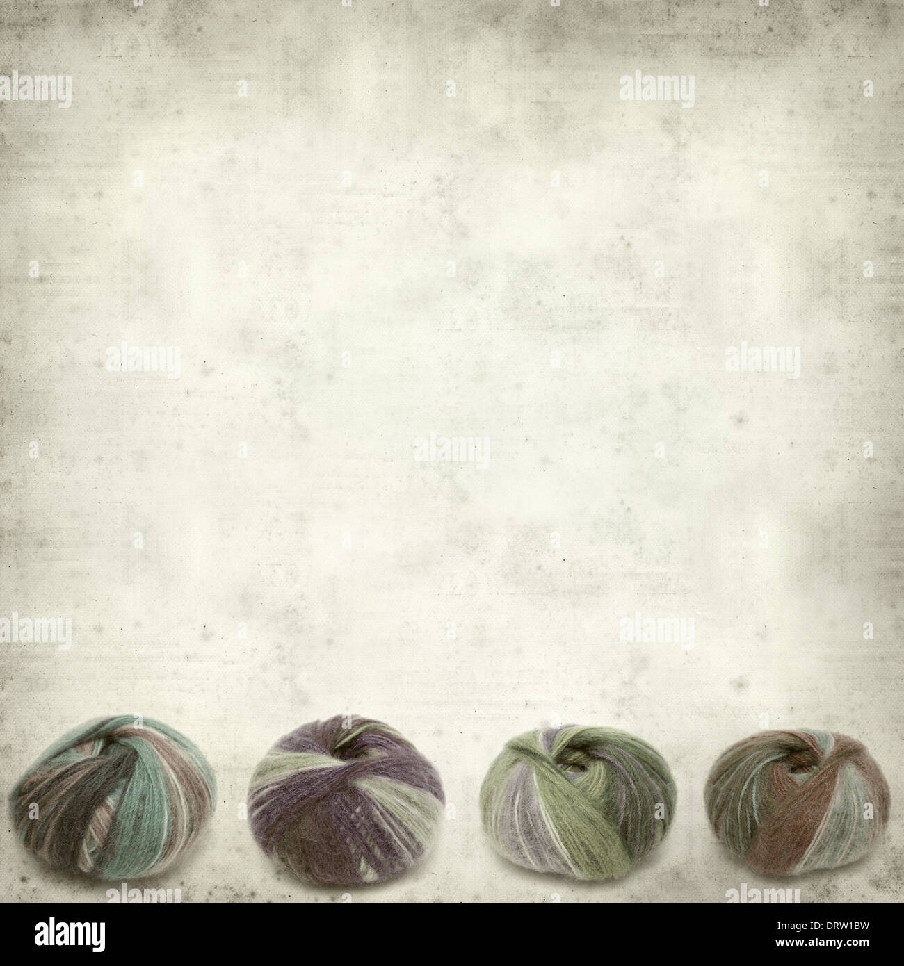 textured old paper background with variegated knitting wool Stock Photo ...