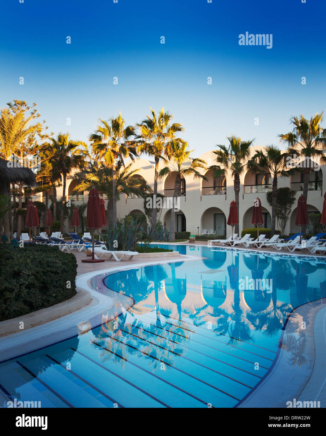 Swimming pool in luxury exotic resort Stock Photo - Alamy