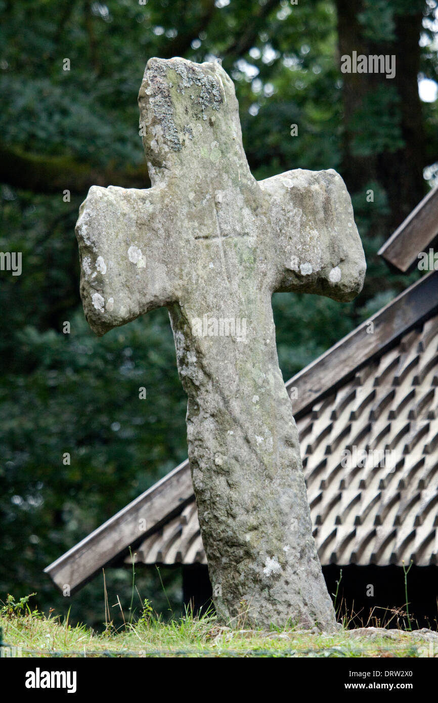 Ancient stone cross outside the Fantoft stave church near Bergen ...