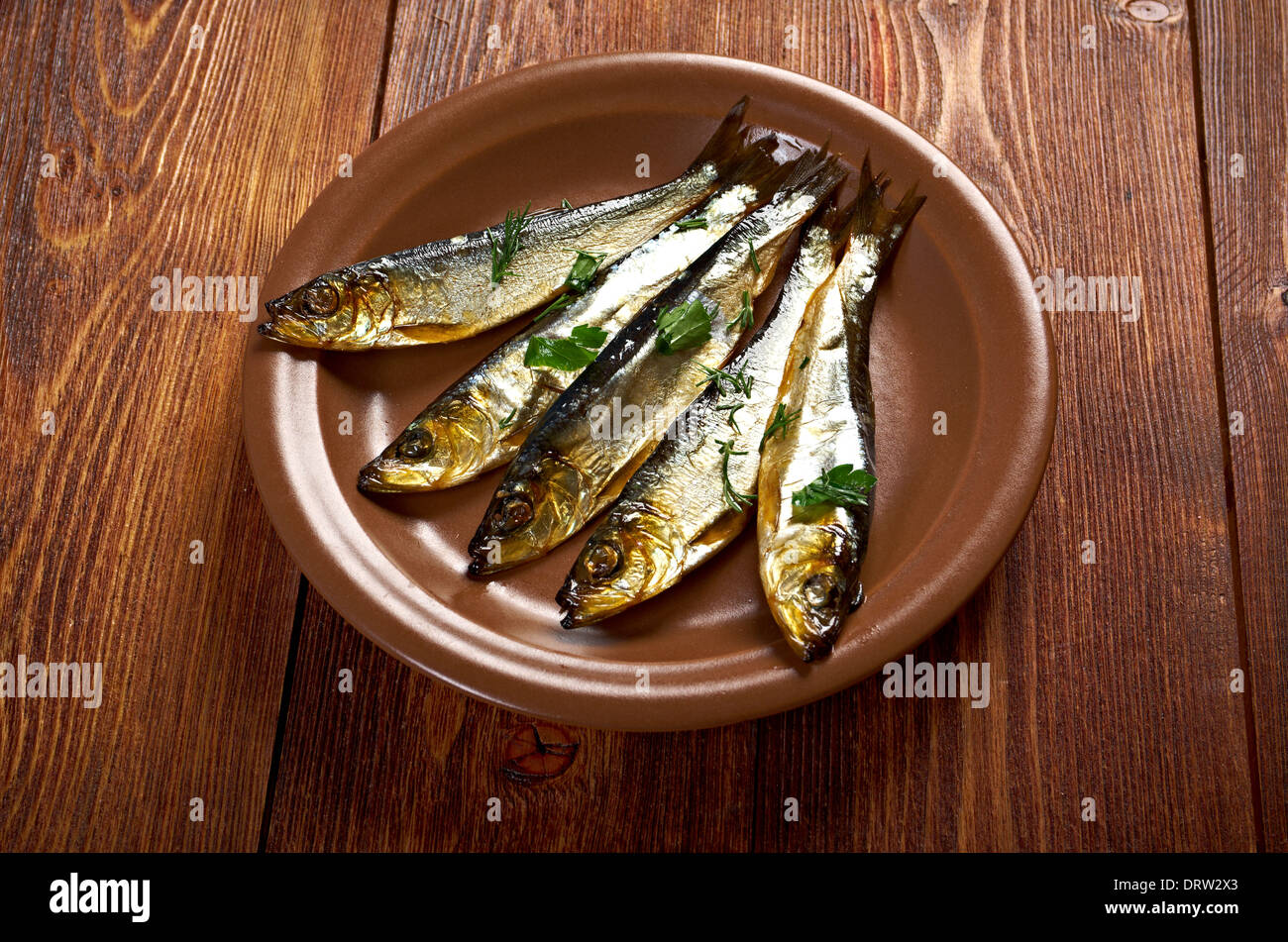 Smoked herring -home-style. closeup Stock Photo - Alamy