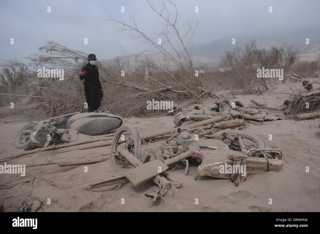 North Sumatra, Indonesia. 2nd Feb, 2014. An Indonesian rescuer searches ...