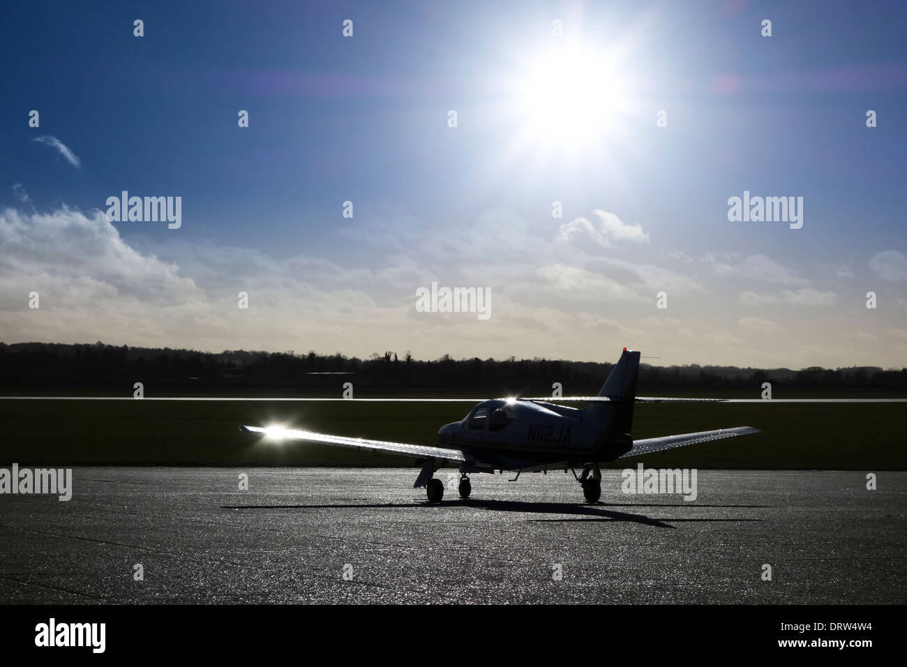 Light aircraft packed in sunlight Stock Photo - Alamy