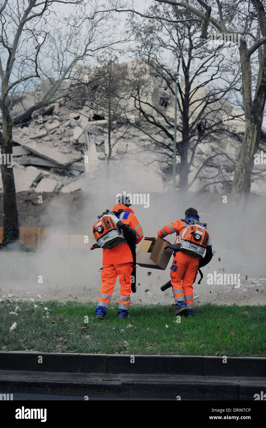 Workers start with the clearing work of the rubble tip of the blown up ...