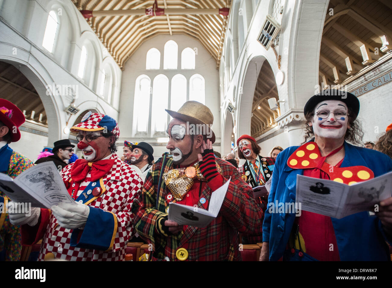 London, UK. 2nd Feb 2014. Clowns gather at the Holy Trinity church for ...