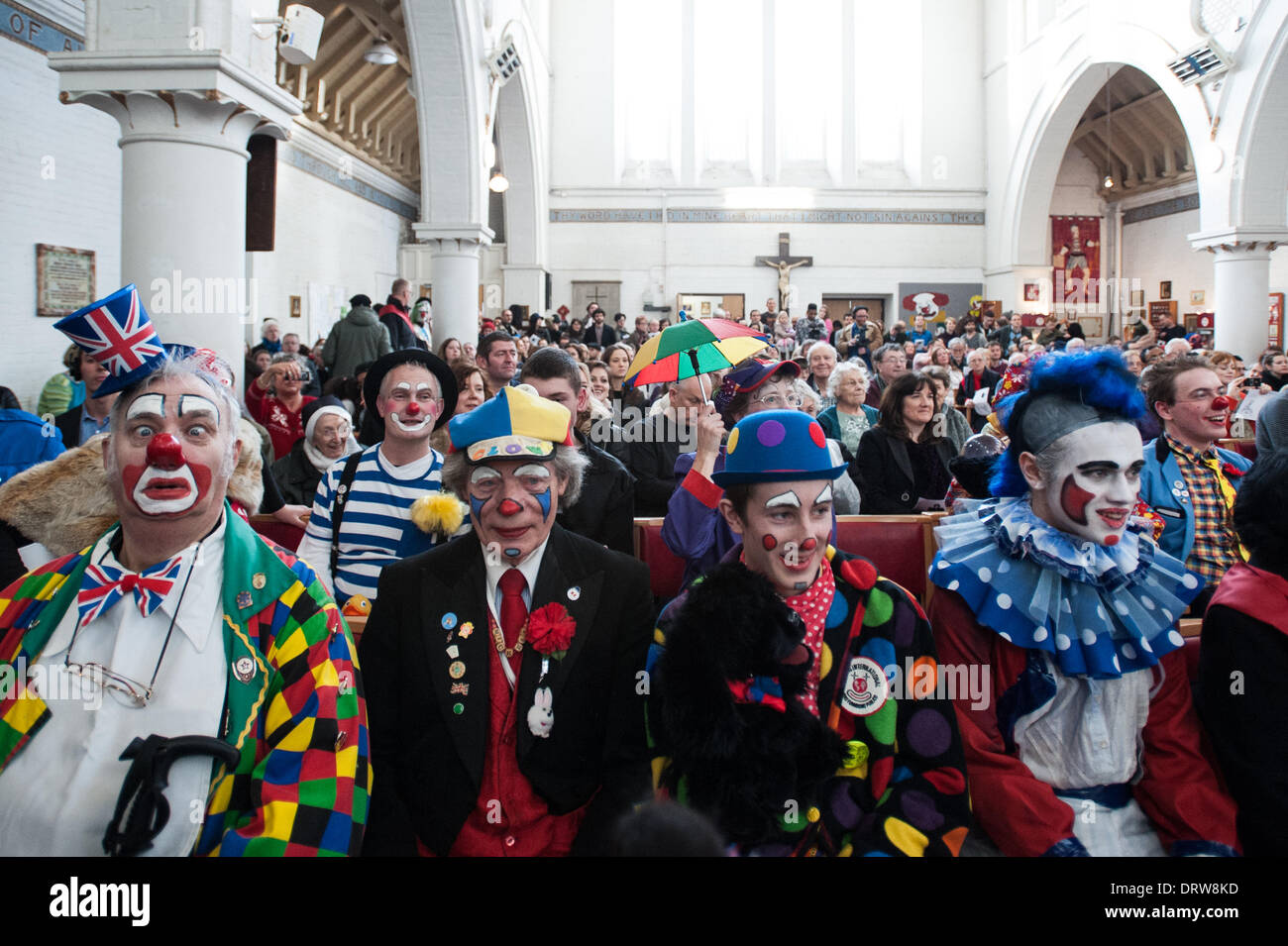 London, UK. 2nd Feb 2014. Clowns gather at the Holy Trinity church for ...