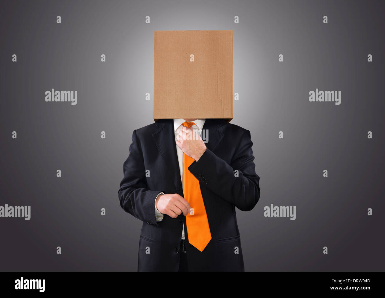businessman hiding his head inside one cardboard box Stock Photo - Alamy