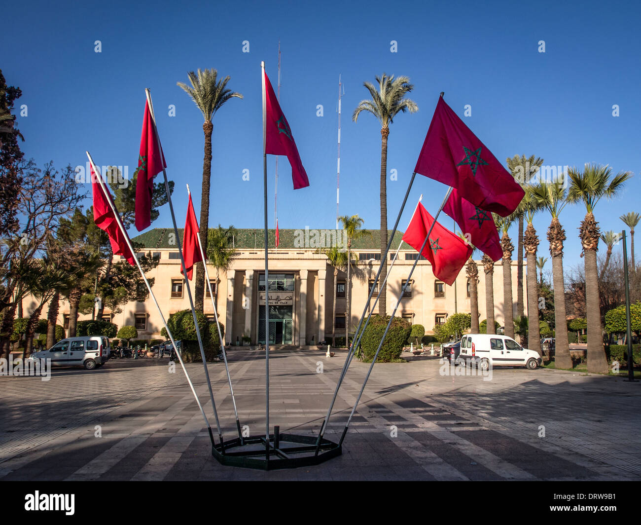 MARRAKECH, MOROCCO - JANUARY 21, 2014: Moroccan Flags in front of City ...