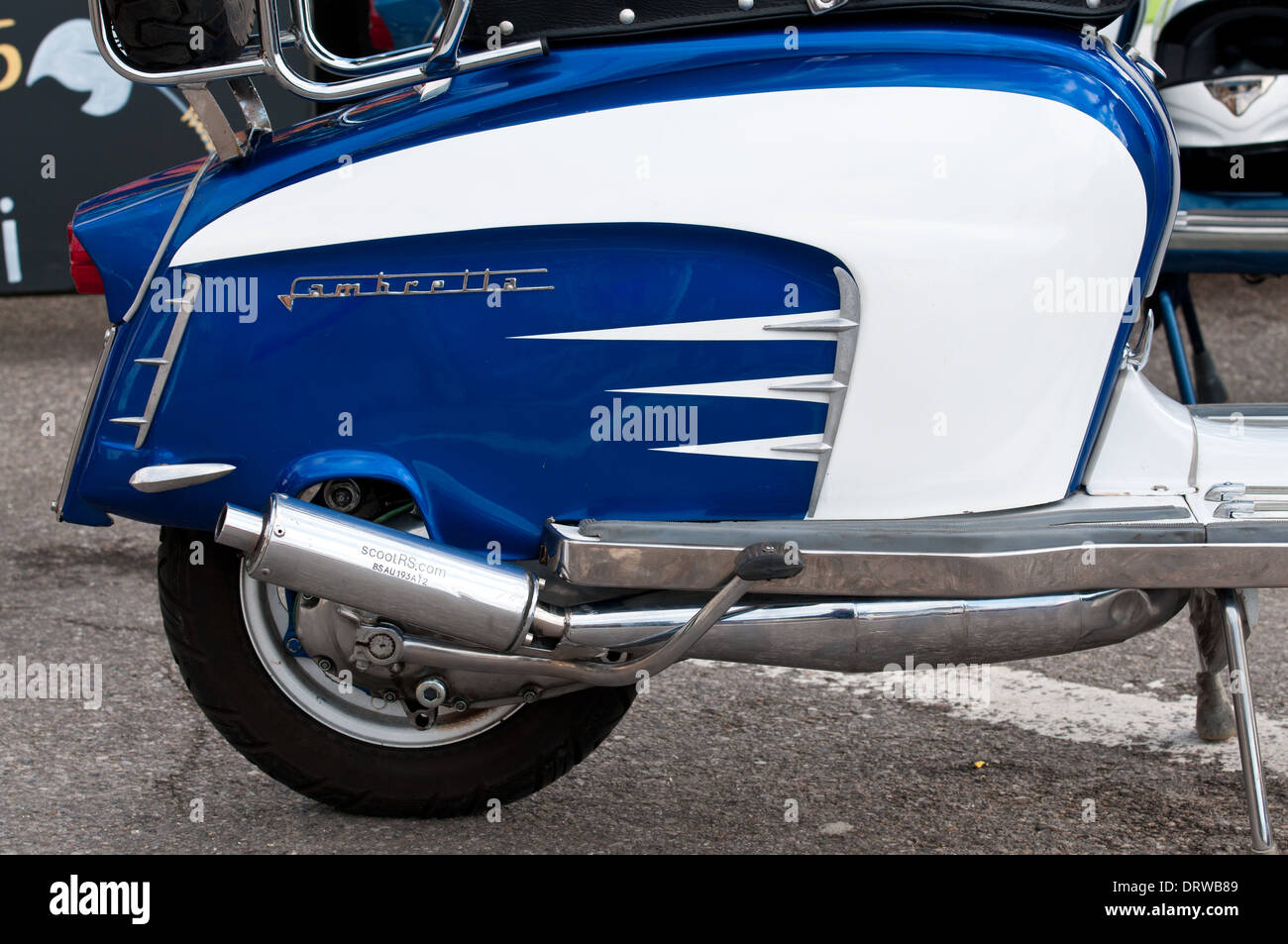 Blue and white scooter Stock Photo - Alamy