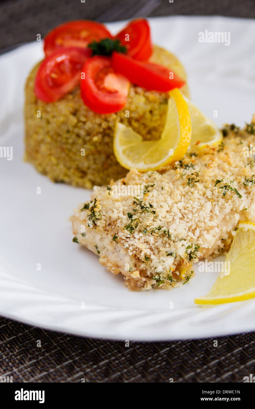 Crispy baked Mahi mahi fish and quinoa Stock Photo - Alamy