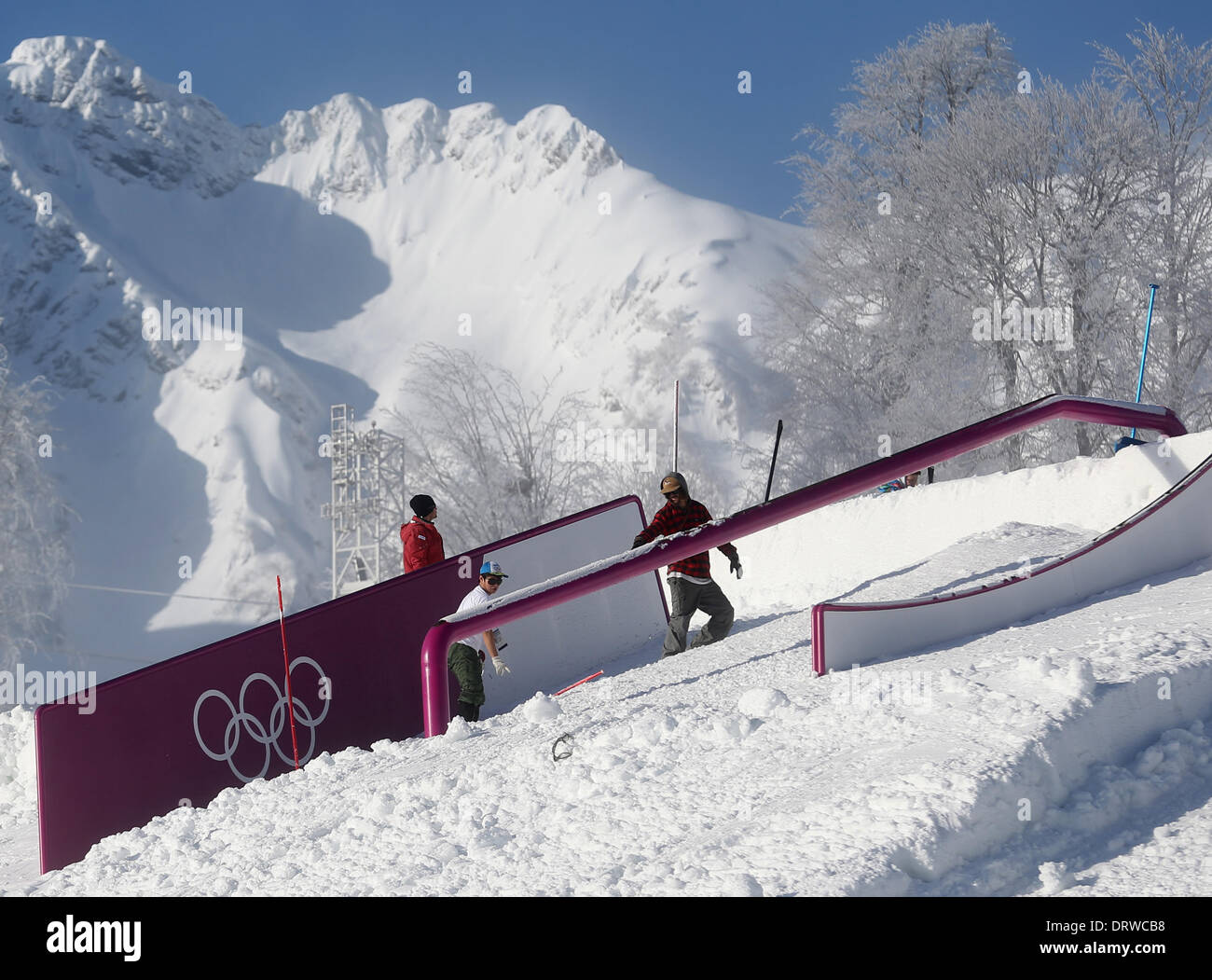 Sochi, Krasnodar region, Russia. 01st Feb, 2014. Athletes check a rail ...