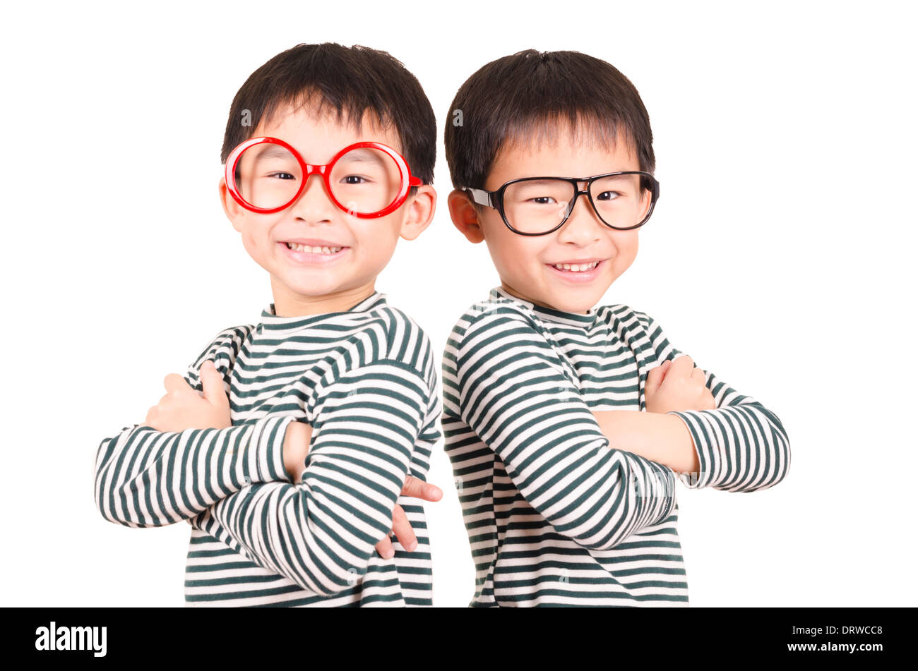 Two brother smiling on white background Stock Photo - Alamy
