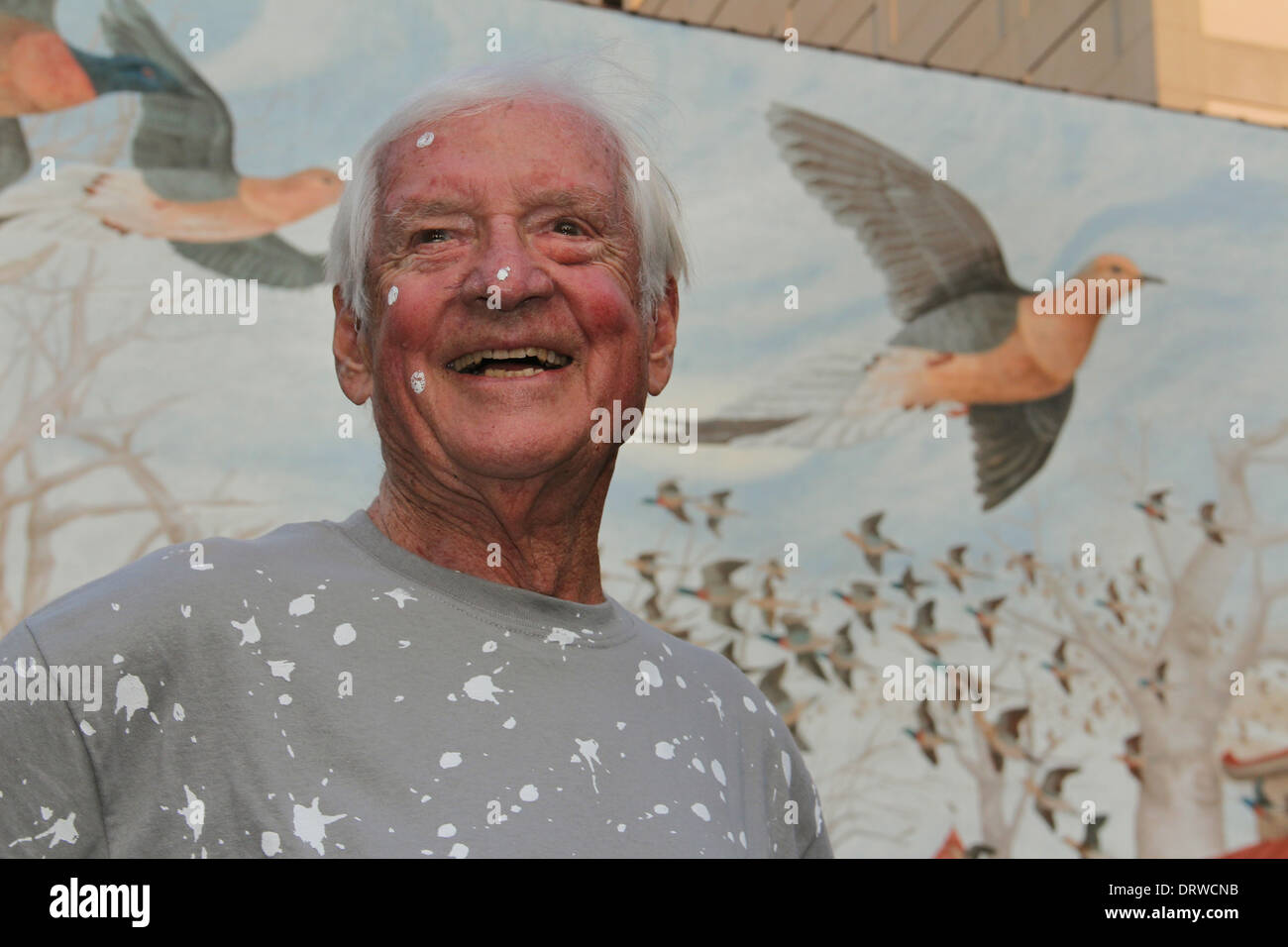 Wildlife artist John Ruthven with passenger pigeon mural on Cincinnati ...