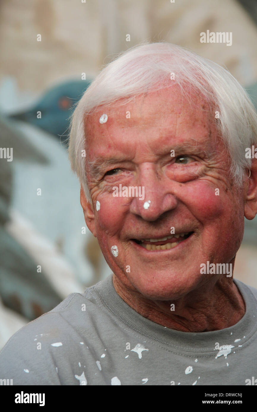Wildlife artist John Ruthven with passenger pigeon mural on Cincinnati ...