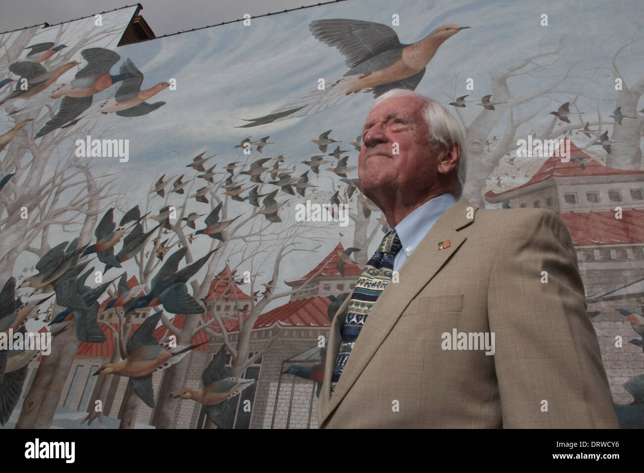 Wildlife artist John Ruthven with passenger pigeon mural on Cincinnati ...