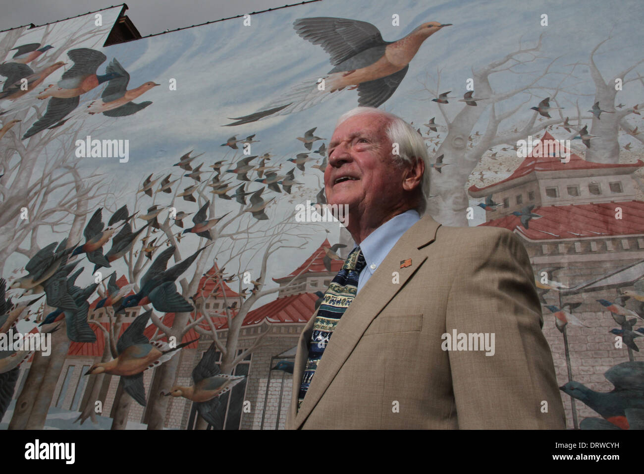 Wildlife artist John Ruthven with passenger pigeon mural on Cincinnati ...