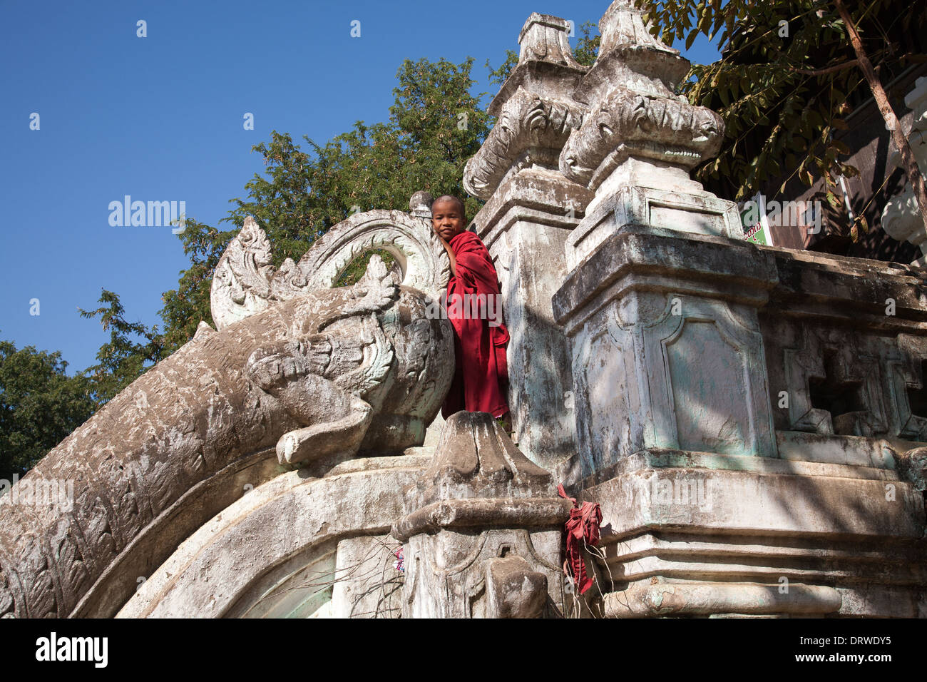 Novice Buddhist Monks on the steps of their Monastery Stock Photo - Alamy
