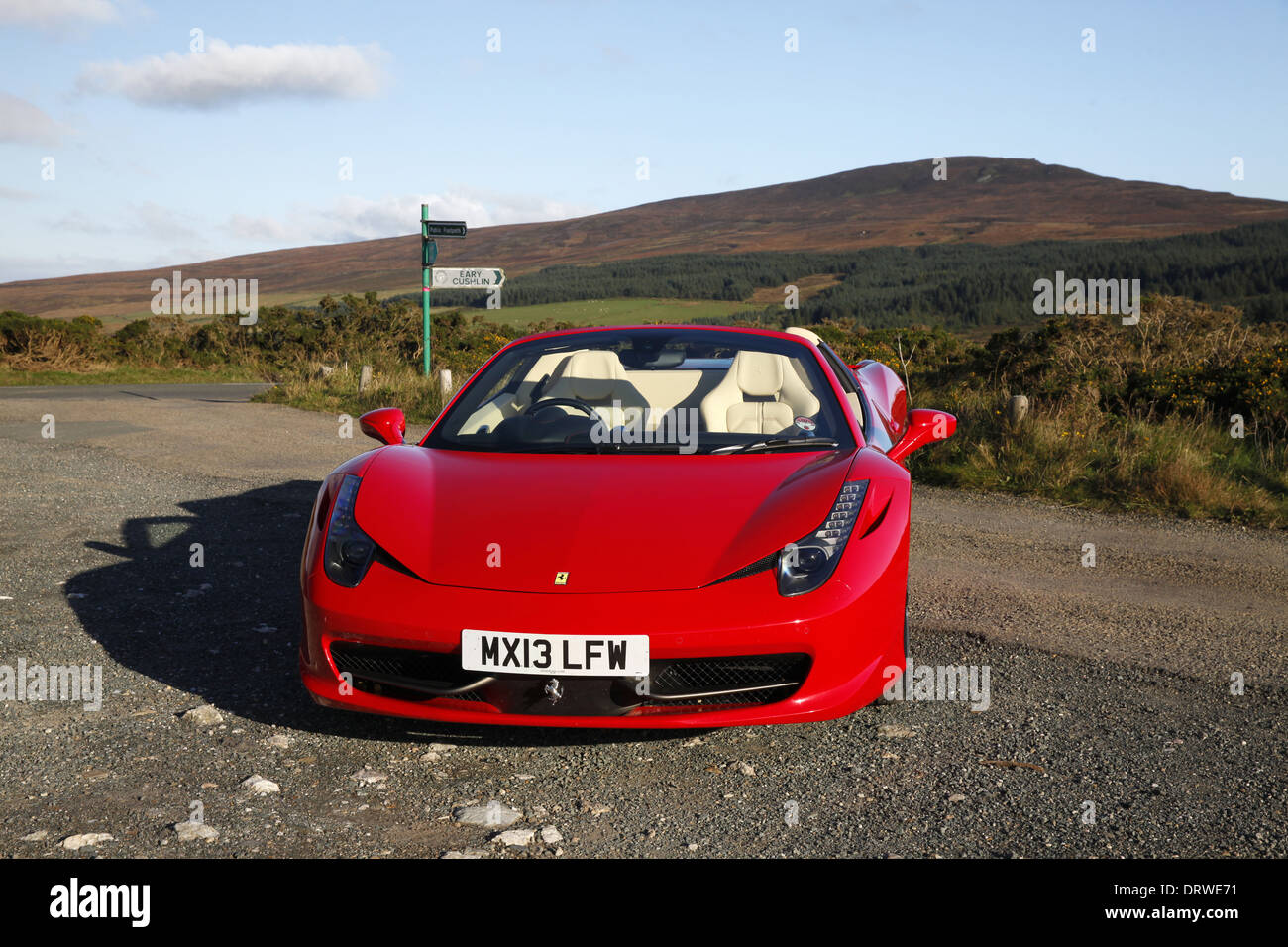 RED FERRARI 458 SPIDER CAR & HILLS ISLE OF MAN 11 October 2013 Stock ...