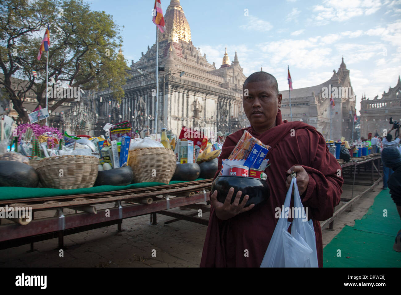Monks receiving alms during The Ananda Festival Bagan, Myanmar (Burma ...