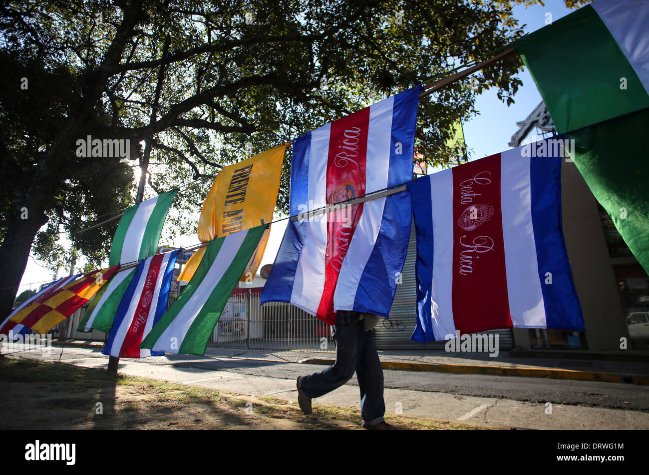San Jose, Costa Rica. 2nd Feb, 2014. A merchant sells flags of ...