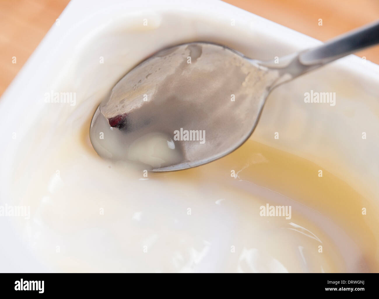Vanilla custard in plastic container hi-res stock photography and ...