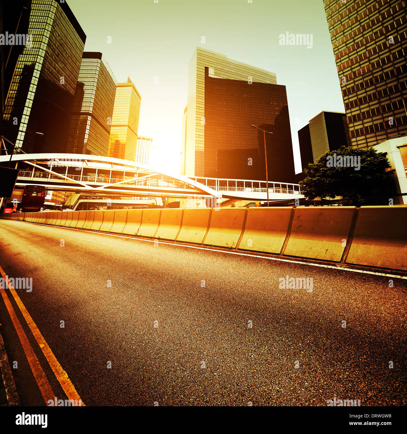 Highway heading to the city Stock Photo - Alamy