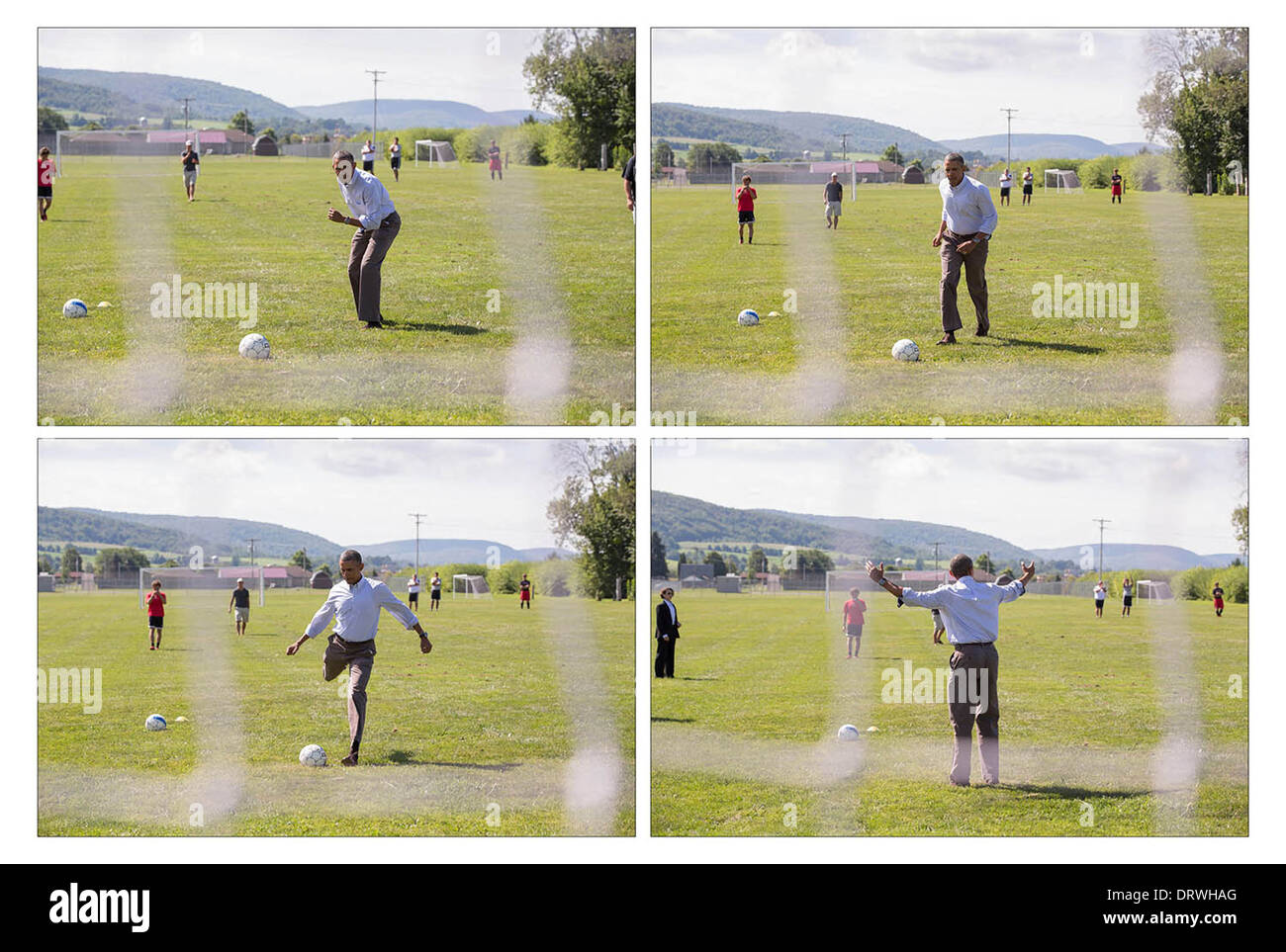 US President Barack Obama kicks a soccer ball during a stop at the ...