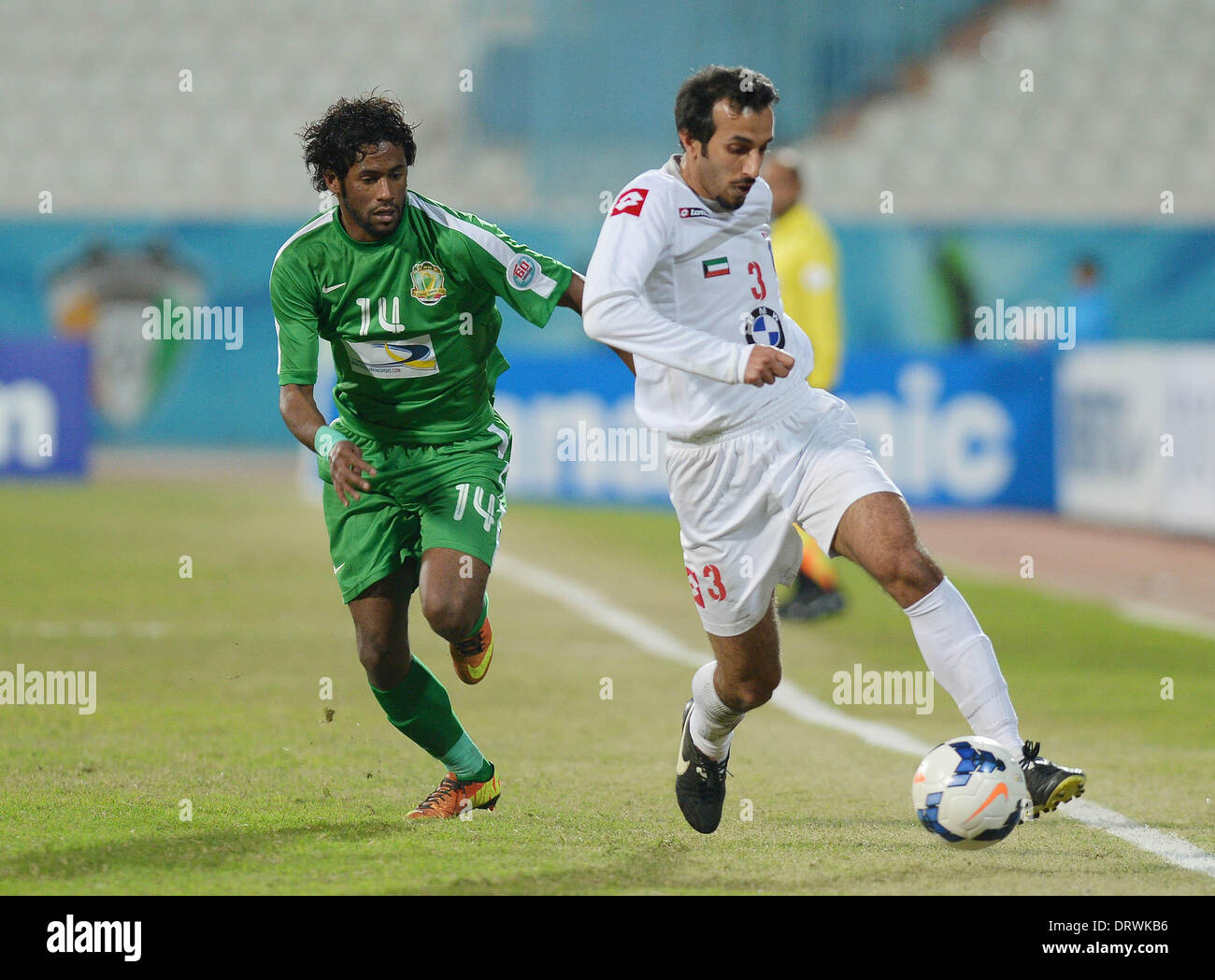 Kuwait City, Kuwait. 03rd Feb, 2014. Fahad Awad (R) of Kuwait's Al ...