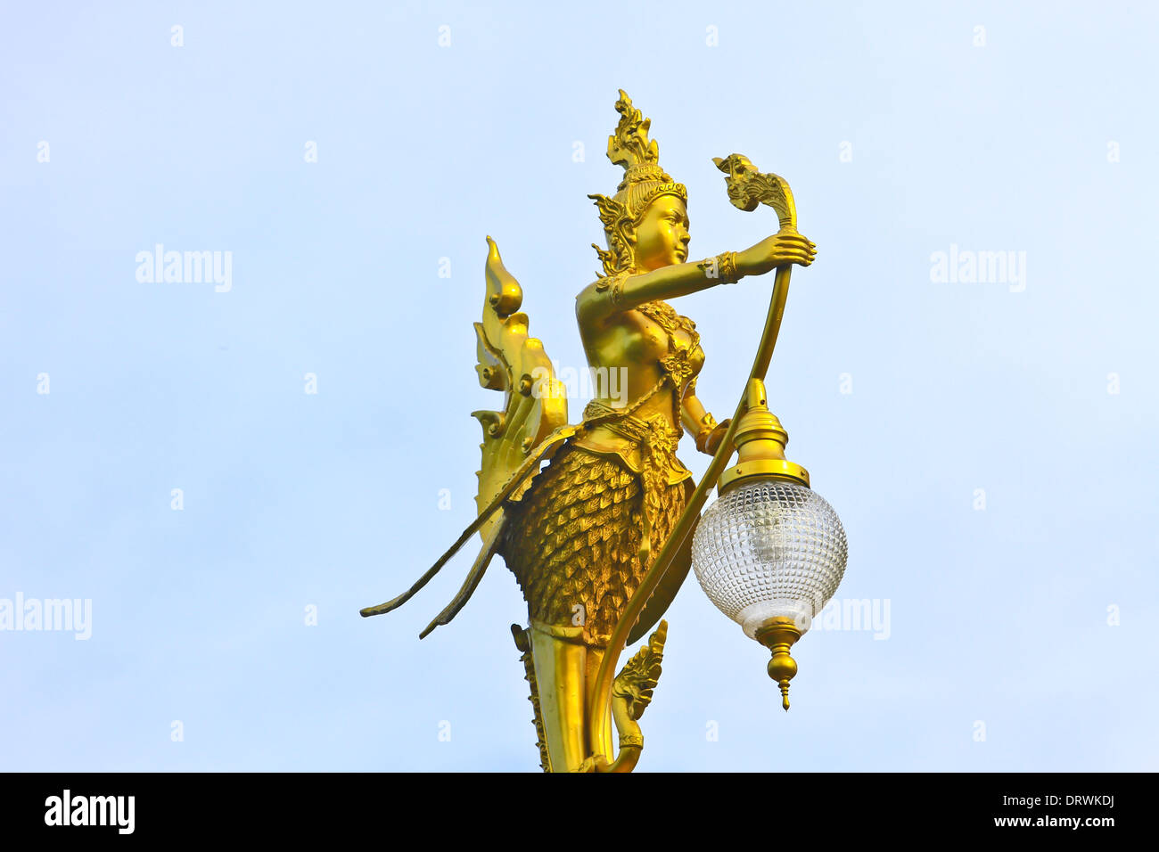 A golden Kinnari lighting pole, Thai style statue Stock Photo - Alamy