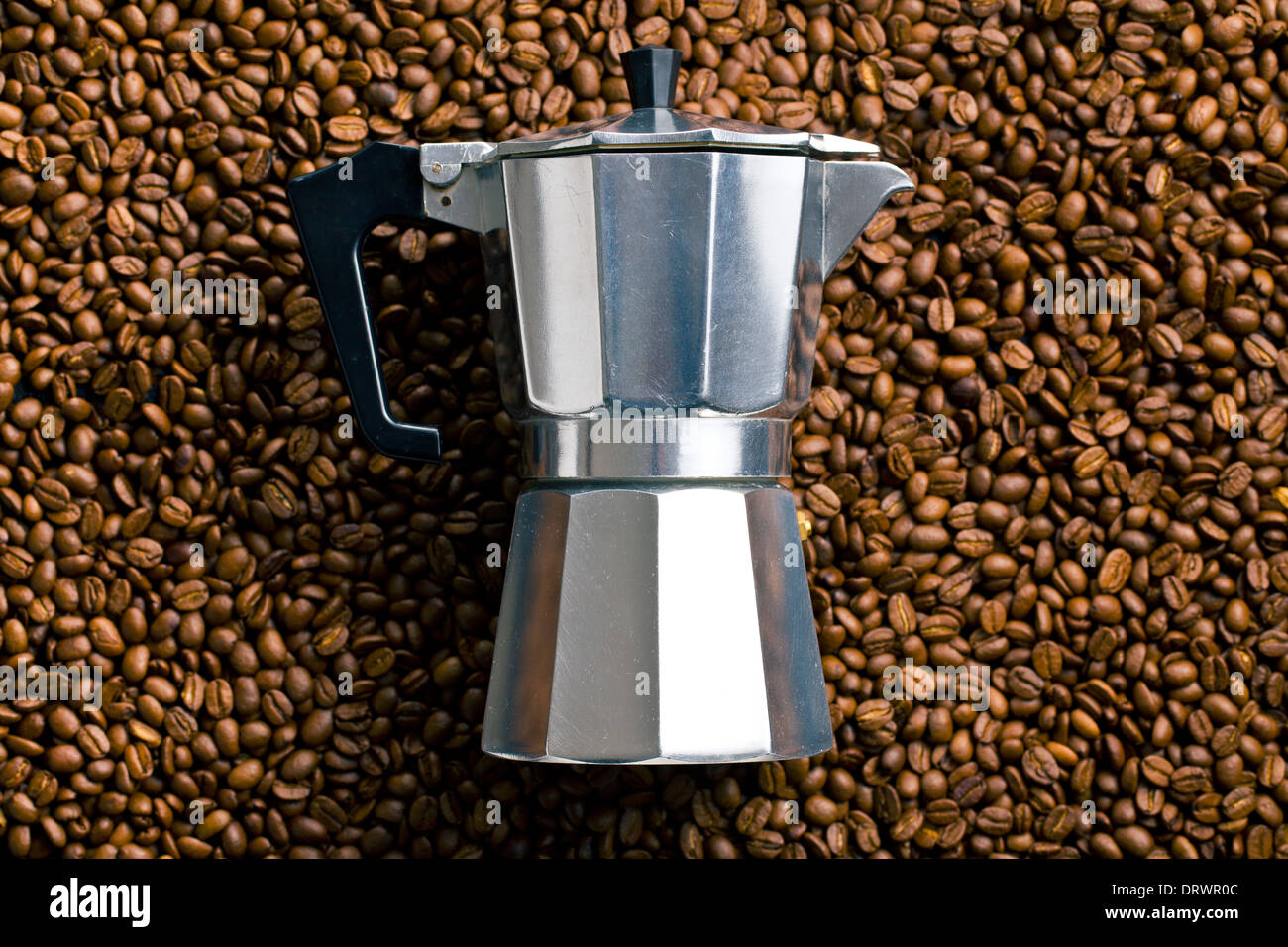 top view of coffee maker on coffee beans Stock Photo - Alamy