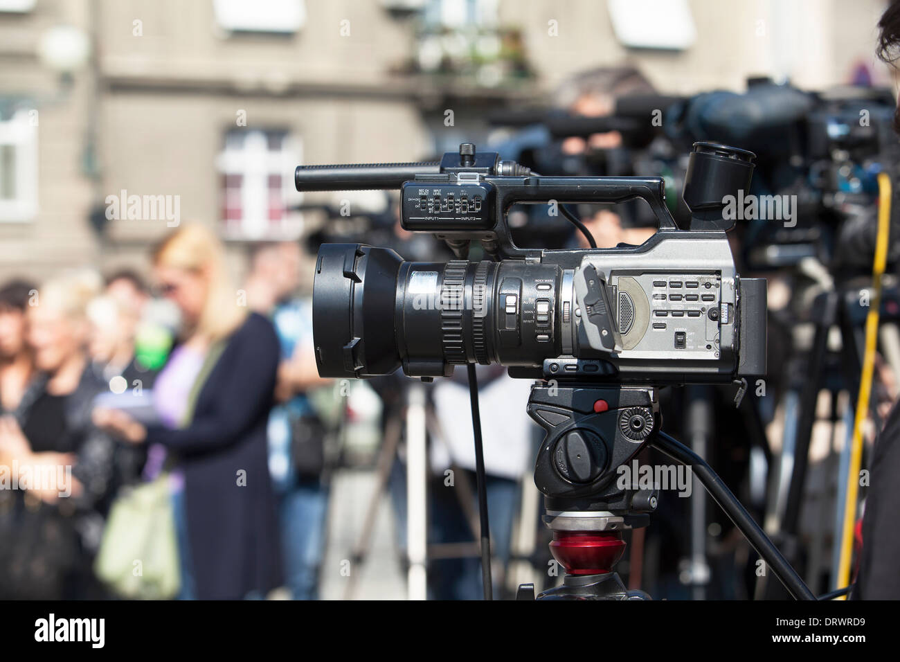 Operator holding video camera hi-res stock photography and images - Alamy