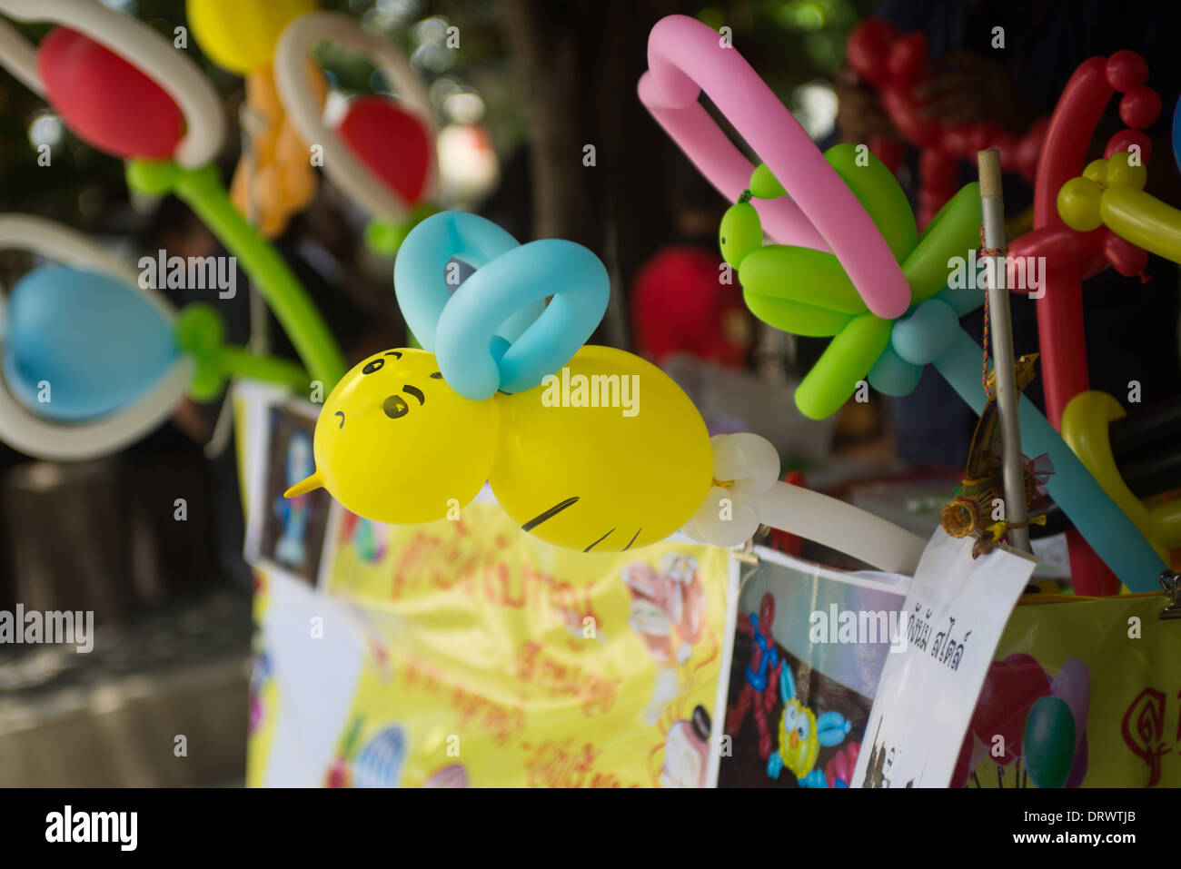 yellow bee balloon, insect shaped balloon at an outdoor local market ...