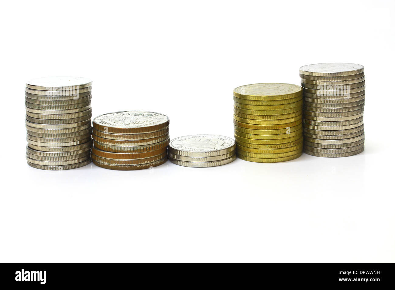 stack of coins isolated on a white background Stock Photo - Alamy