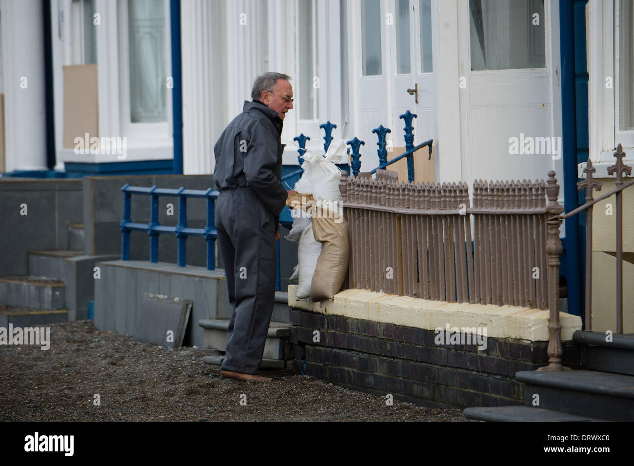 Person in front of house wales hi-res stock photography and images - Alamy