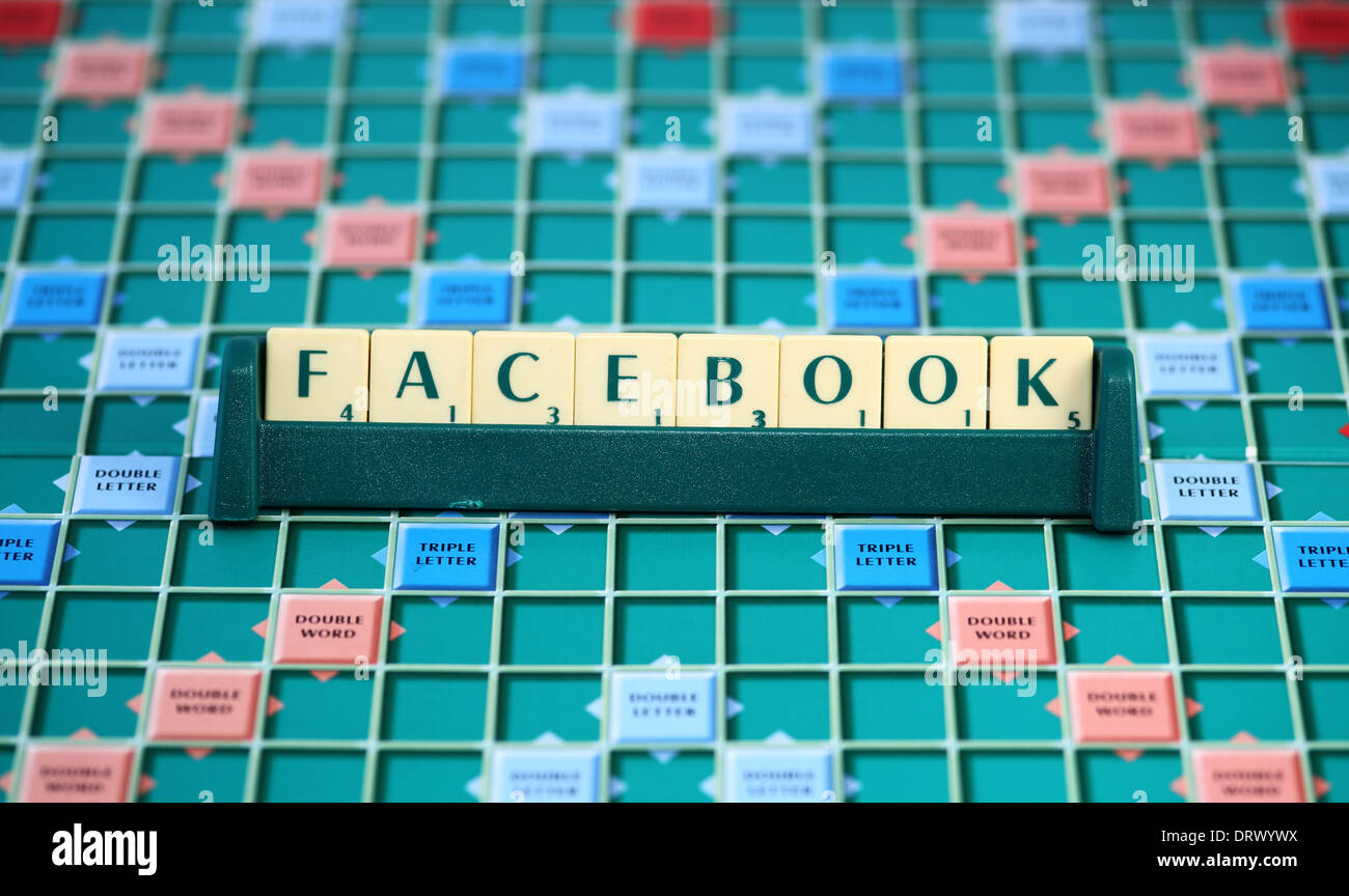 scrabble board game tiles facebook Stock Photo - Alamy