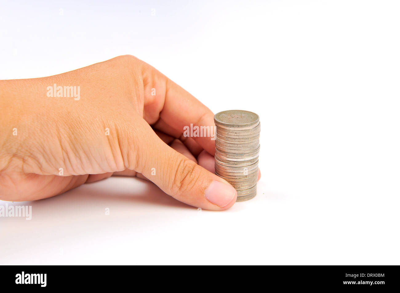 Hand with coin hi-res stock photography and images - Alamy