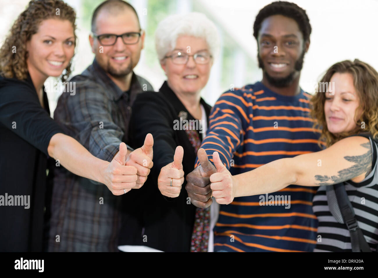 Students and Professor Showing Thumbs Up Stock Photo - Alamy