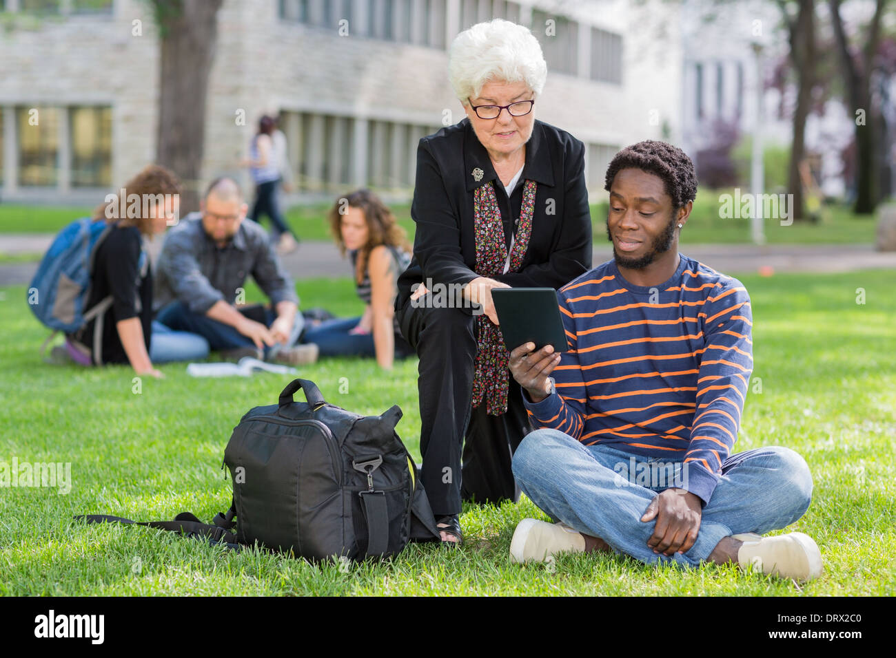 College Professor helping Student Stock Photo - Alamy