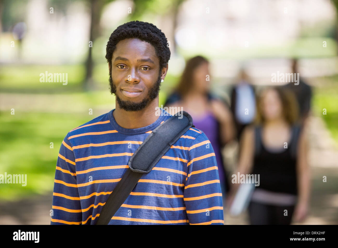 Handsome college student on campus hi-res stock photography and images ...