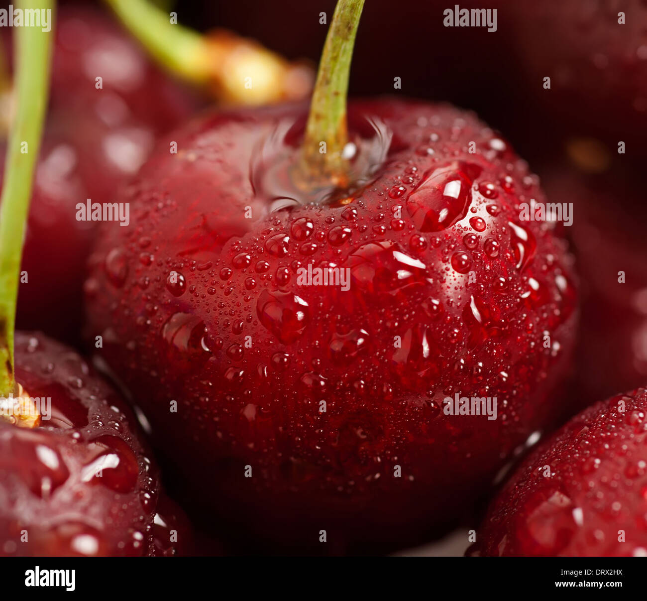 Sweet cherry background Stock Photo - Alamy