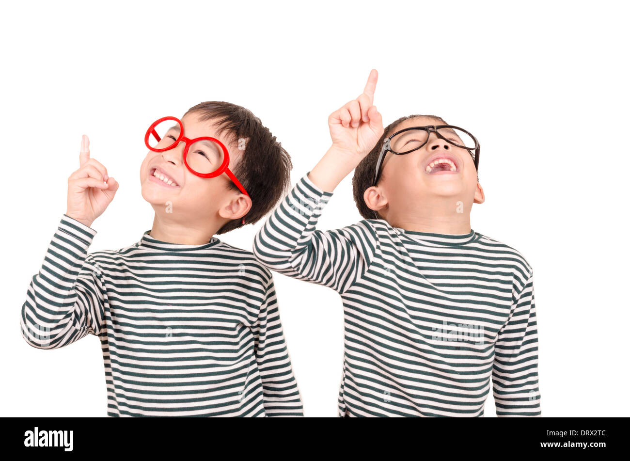 Two brother smiling on white background Stock Photo - Alamy
