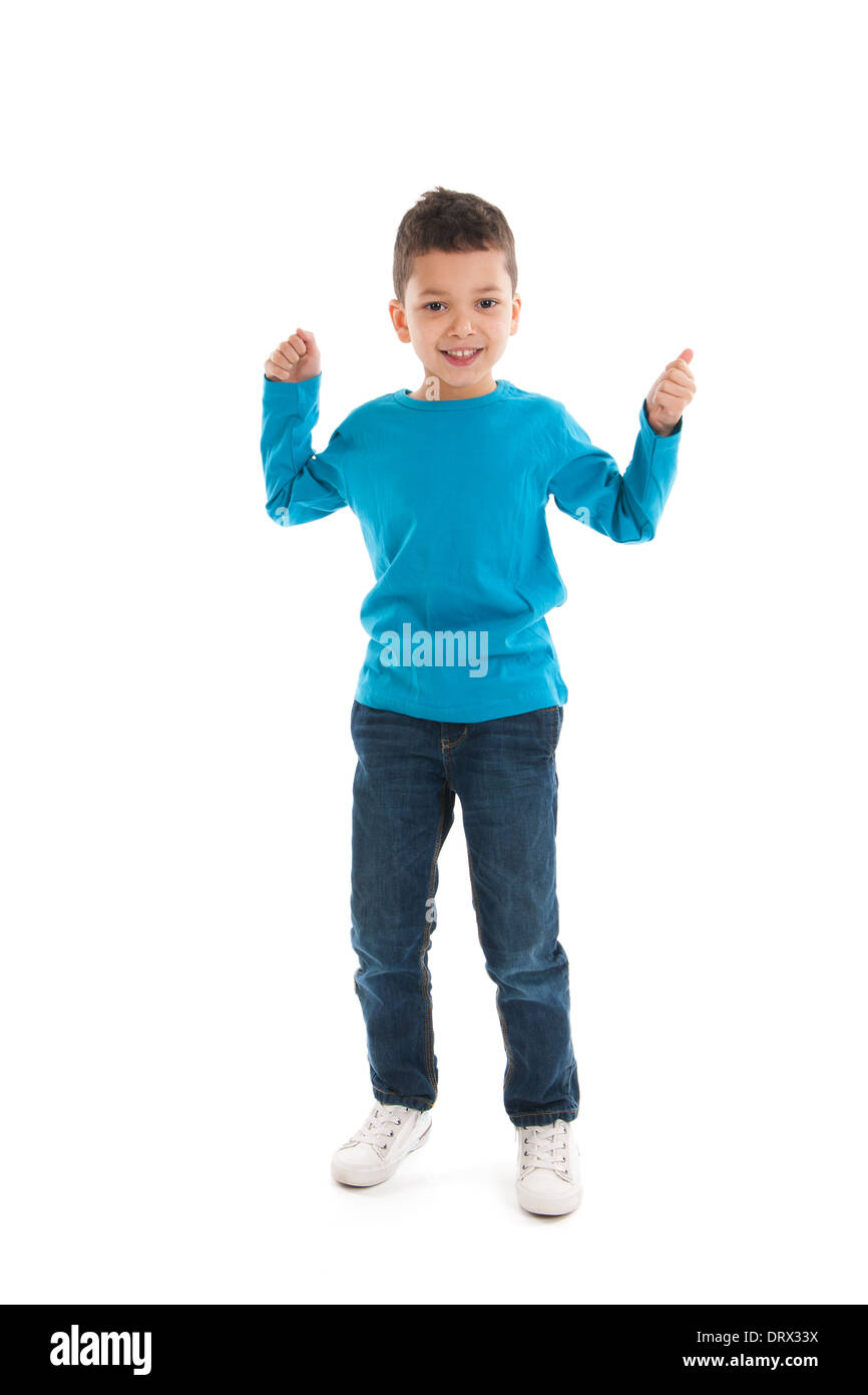 Little boy is standing in the studio isolated over white background ...